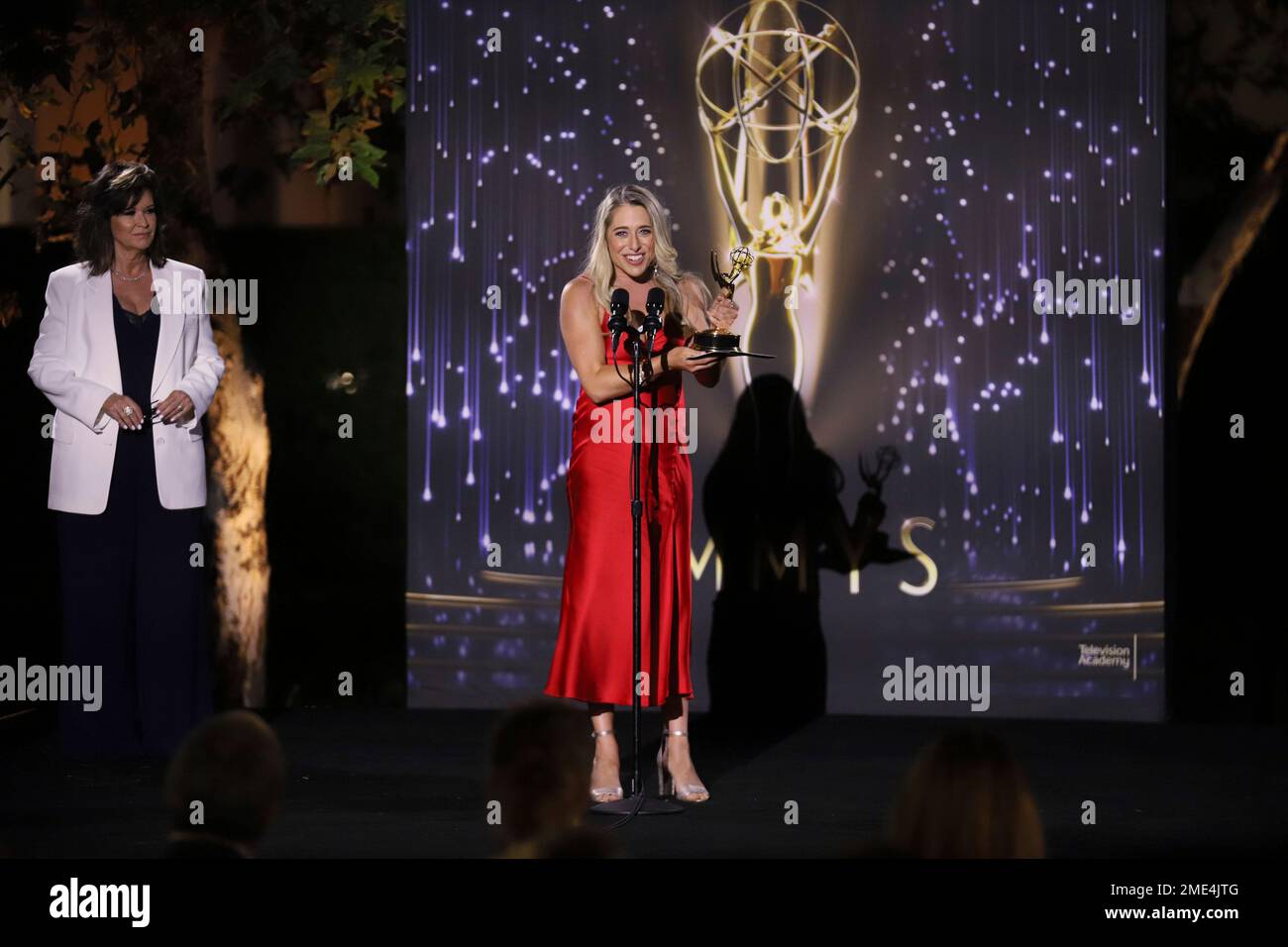 Sarah Pilla accepts the Environment News Story Emmy for Spectrum News 1 ...