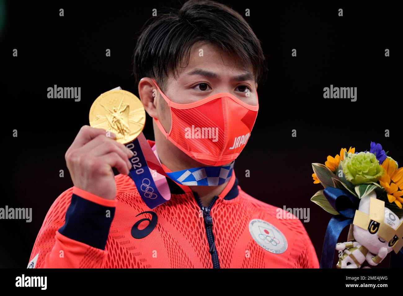 Gold medalist Hifumi Abe of Japan poses after the medal ceremony for ...