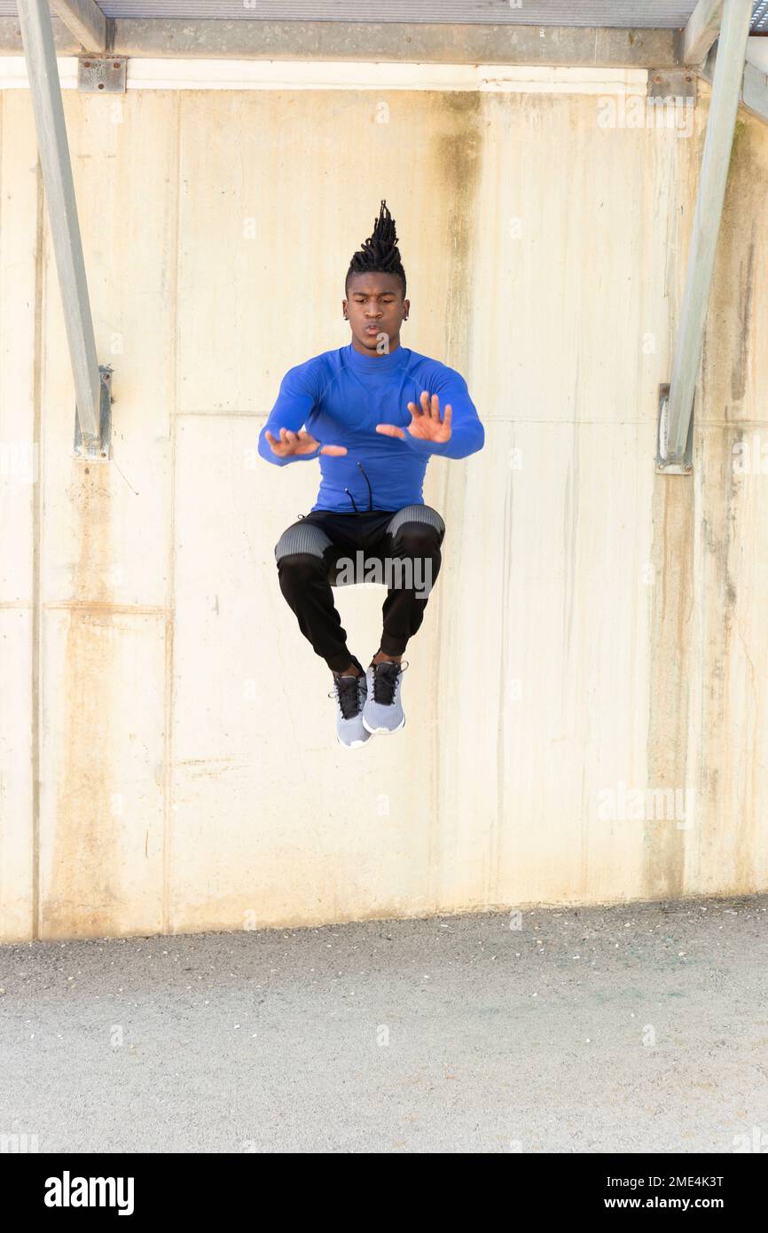 Young muscular man doing exercise hi-res stock photography and images ...