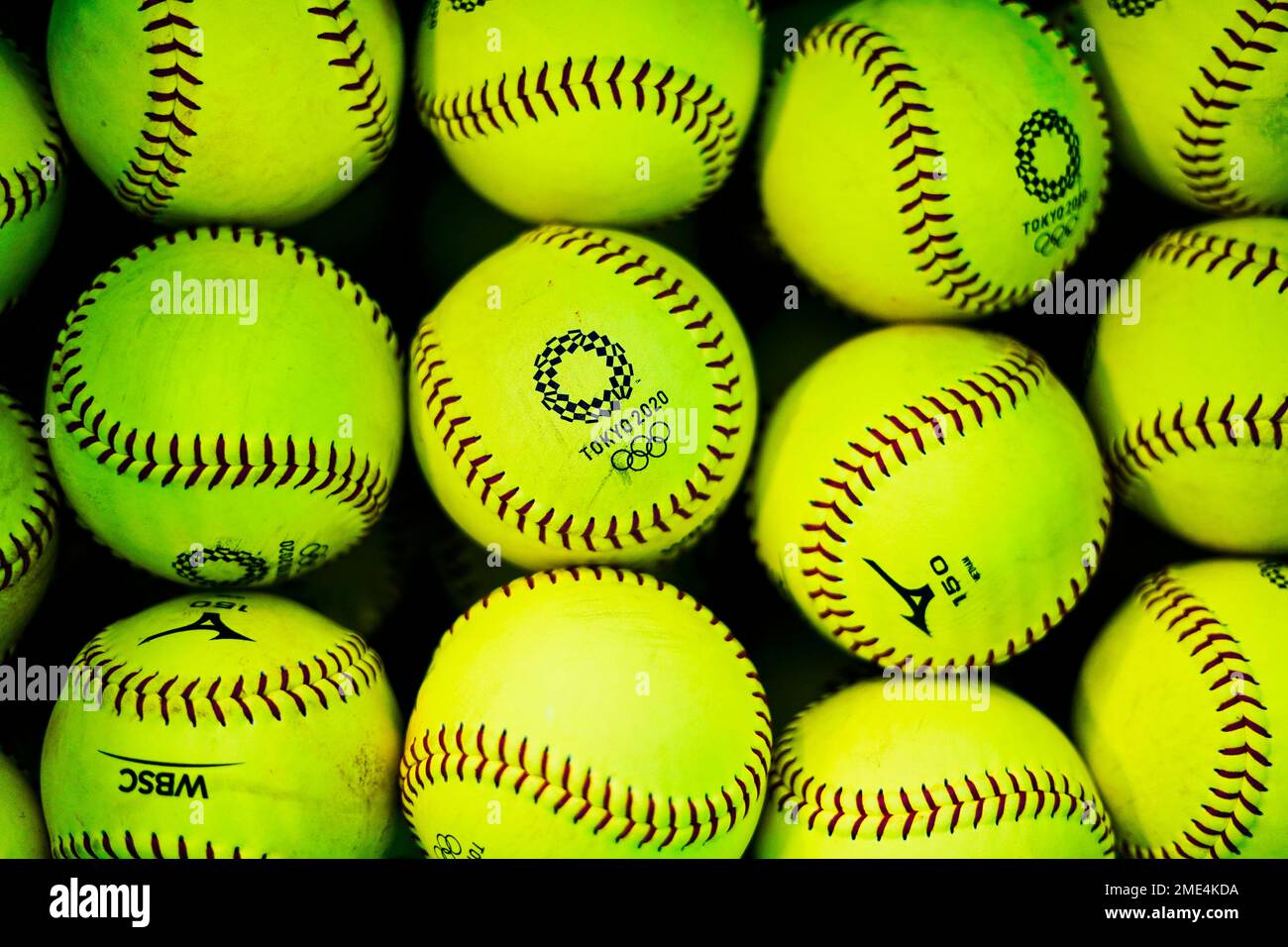 Shown are balls ahead of a softball game between Italy and Mexico at ...