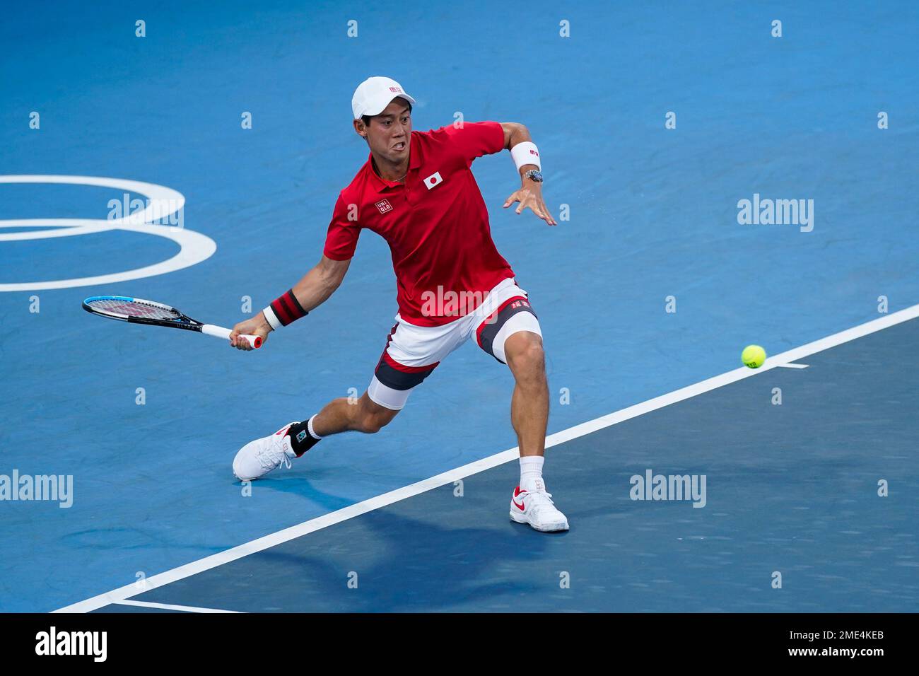 Kei Nishikori, of Japan, returns to Andrey Rublev, of the Russian ... Kei Nishikori, of Japan, returns to Andrey Rublev, of the Russian ...