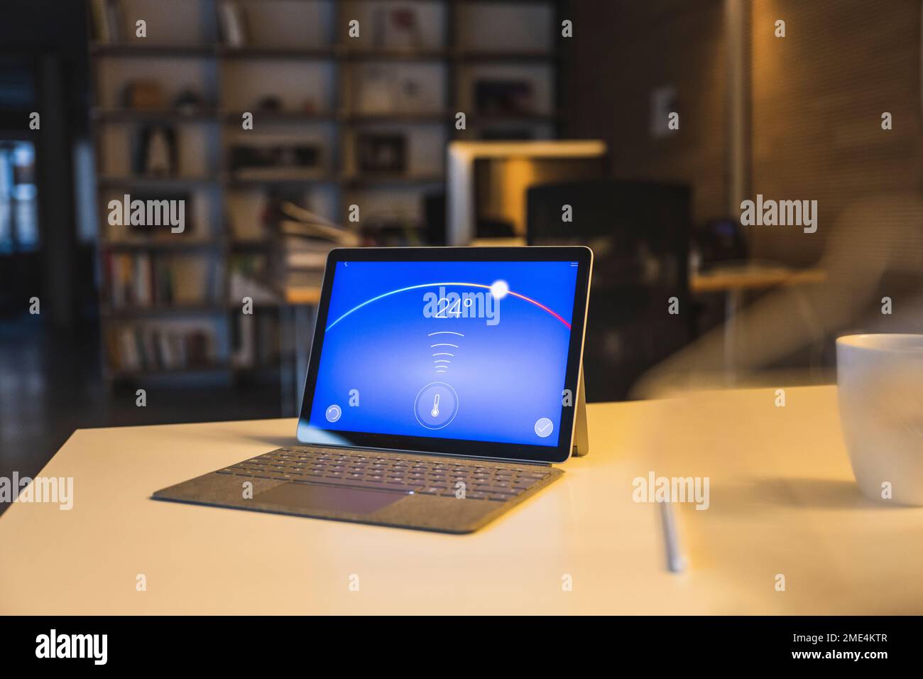 Tablet PC with temperature control dashboard on screen Stock Photo - Alamy