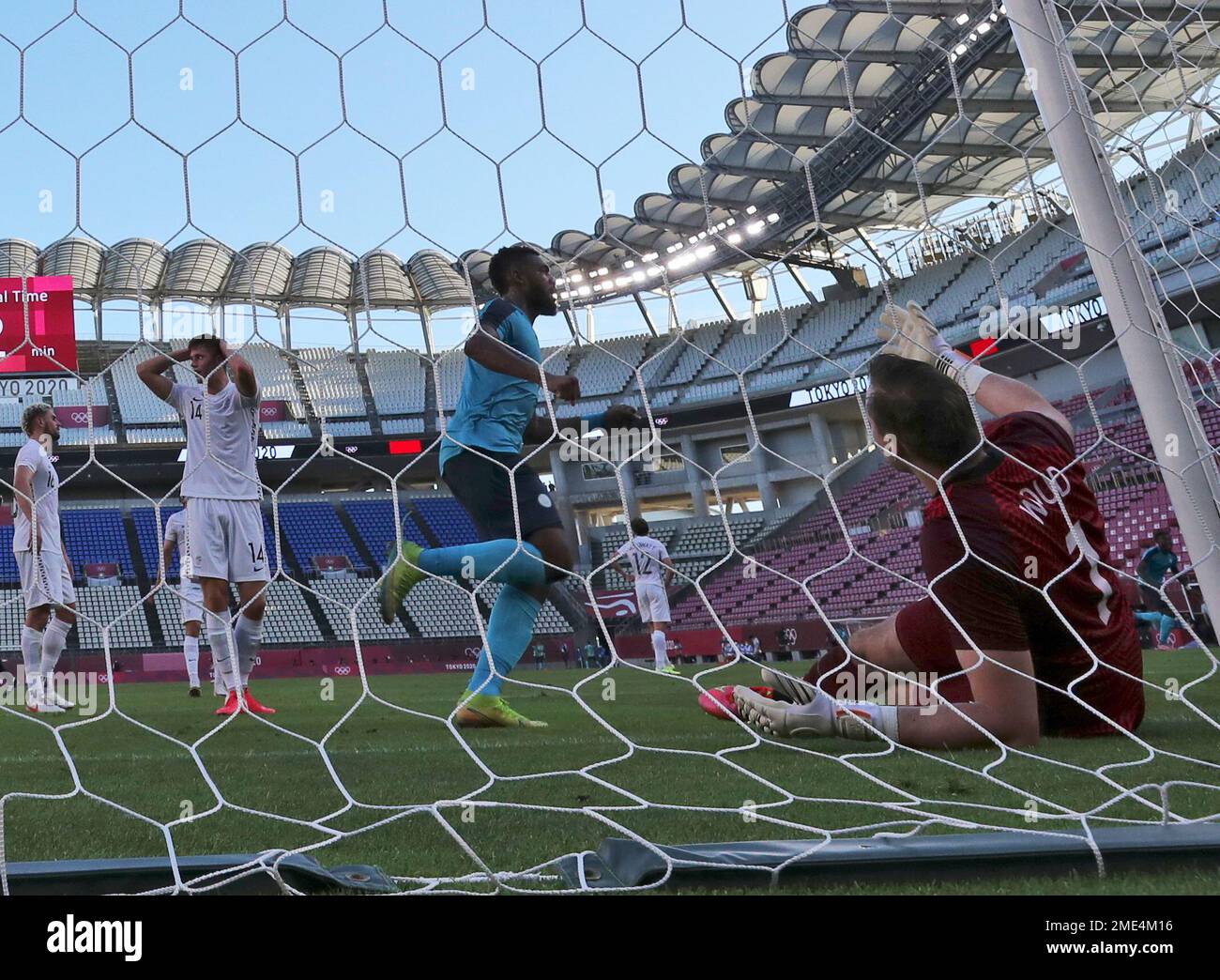 New Zealand's goalkeeper Michael Woud, right, reacts after failing to ...