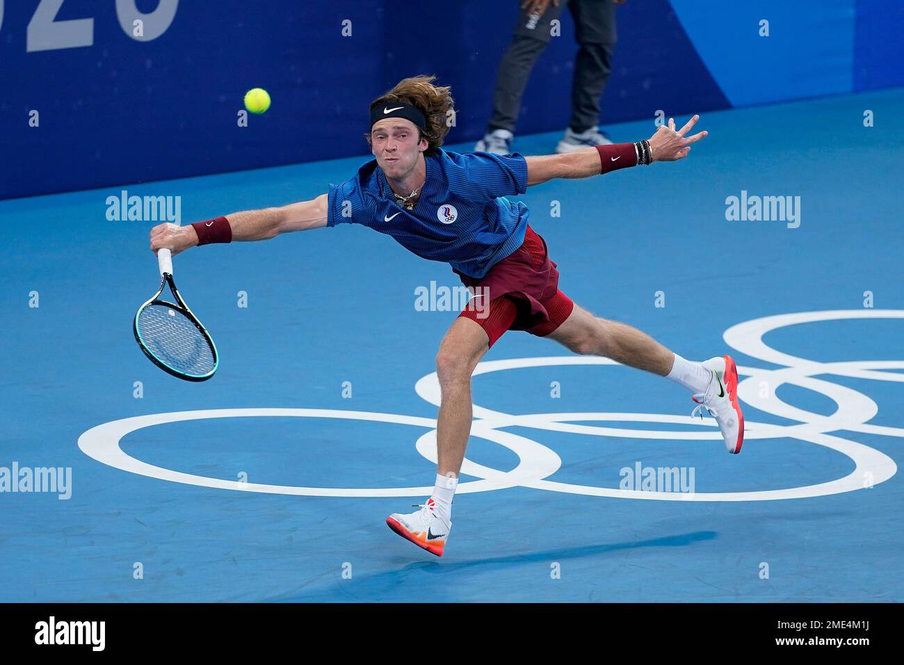 Andrey Rublev, of the Russian Olympic Committee, returns to Kei ... Andrey Rublev, of the Russian Olympic Committee, returns to Kei ...