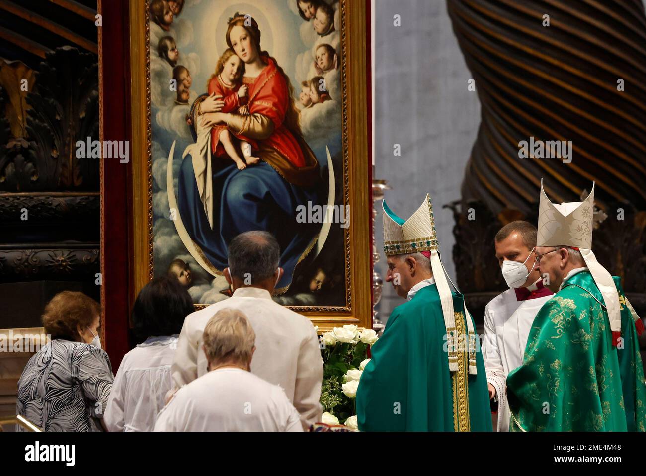 Cardinal Kevin Joseph Farrell, right, attends a Mass led by Monsignor ...