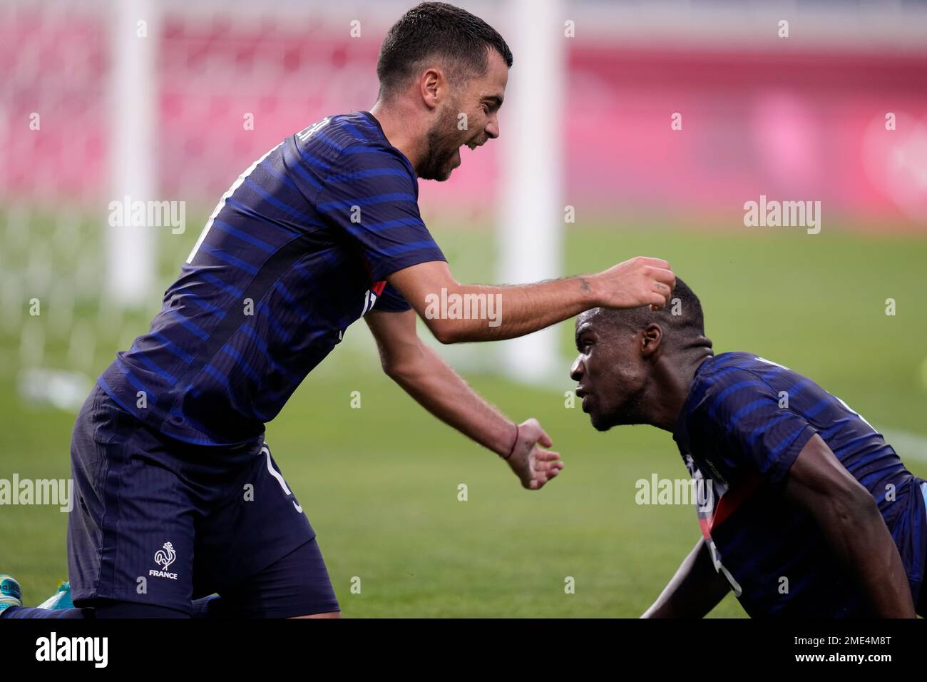 France's Teji Savanier celebrates with teammate Raldal Kolo Muani after ...