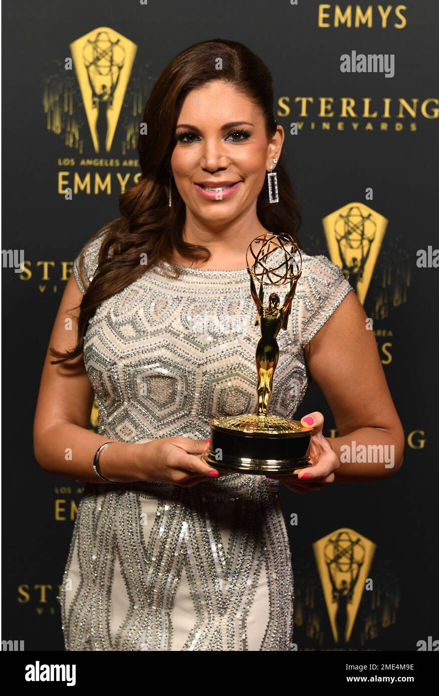 Armida Mier backstage after winning the Feature Segment Emmy for KVEA's ...