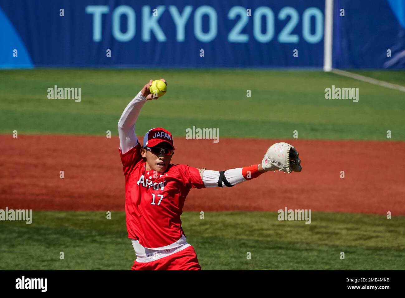 Japan's Yukiko Ueno (17) pitches against Canada in a softball game in ...