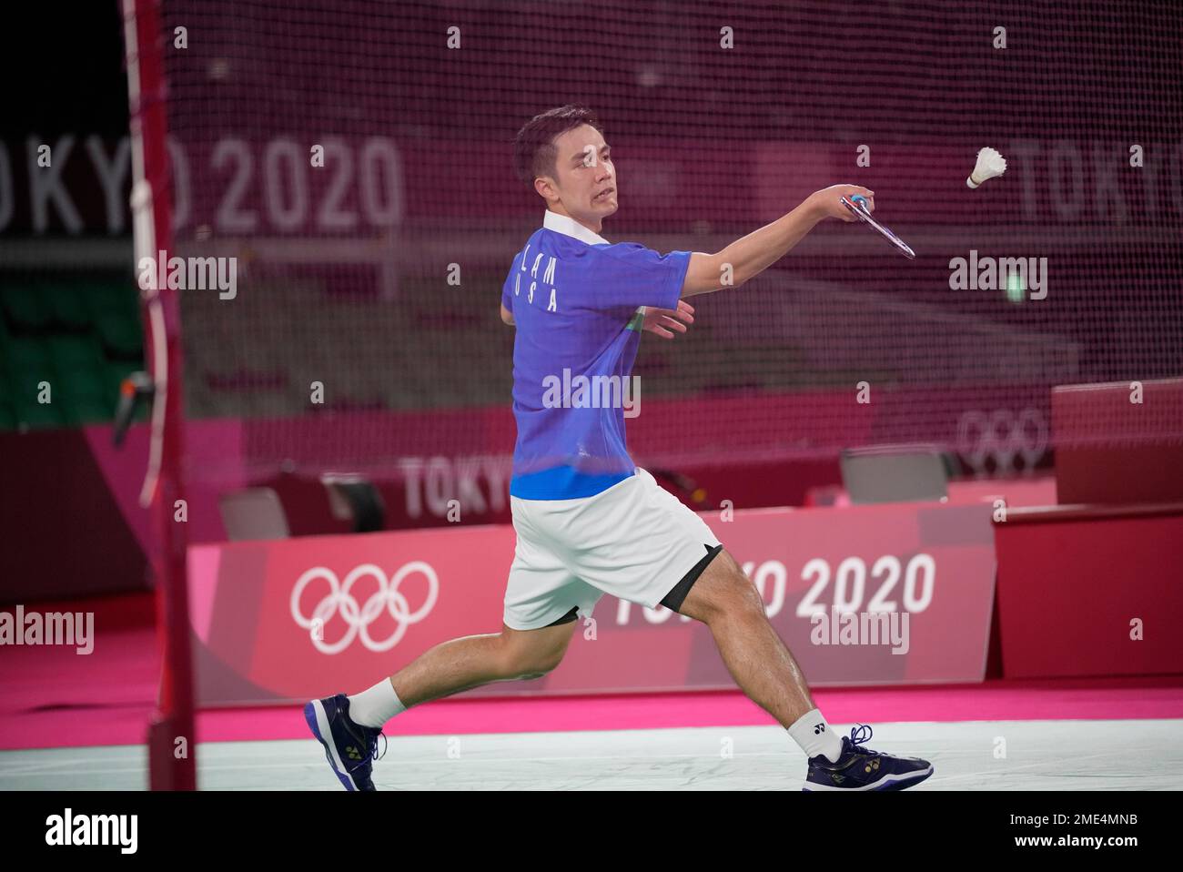 USA's Timothy Lam competes against Kento Momota of Japan during men's ...