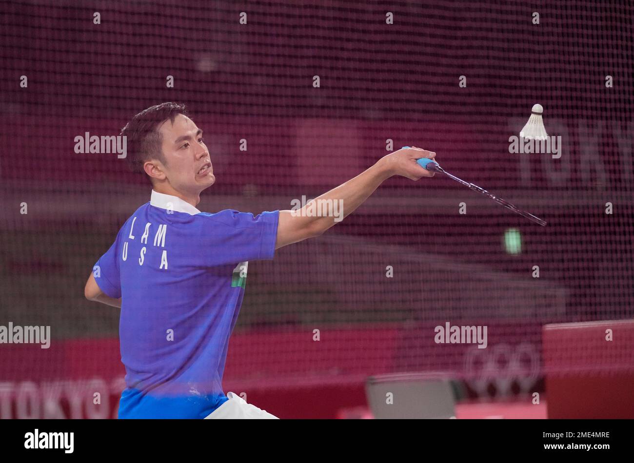 USA's Timothy Lam competes against Kento Momota of Japan during men's ...