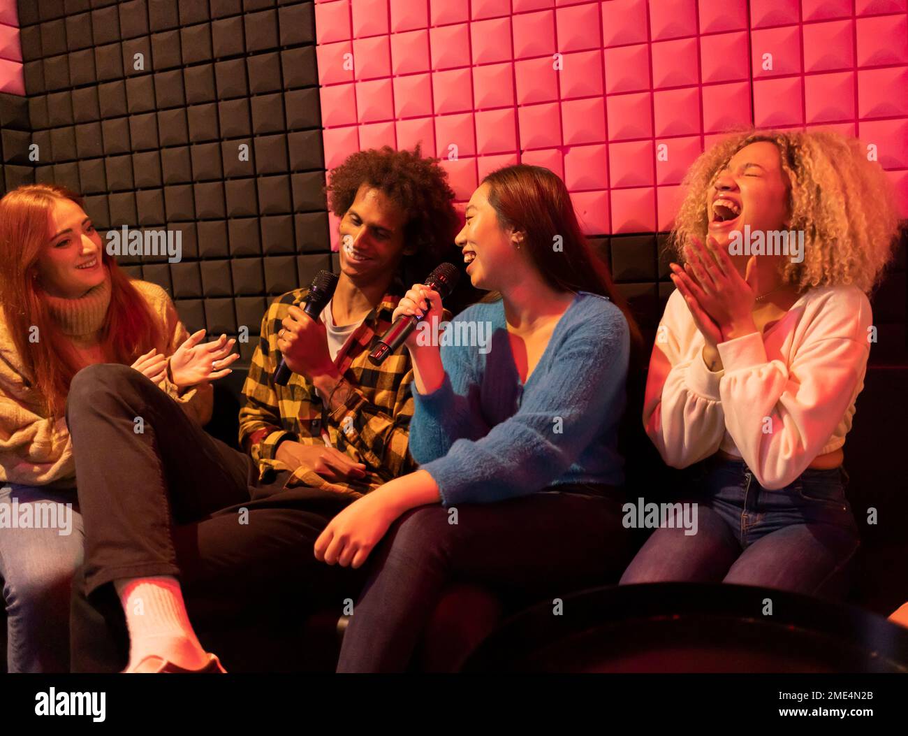 Asian young man holding microphone hi-res stock photography and images ...