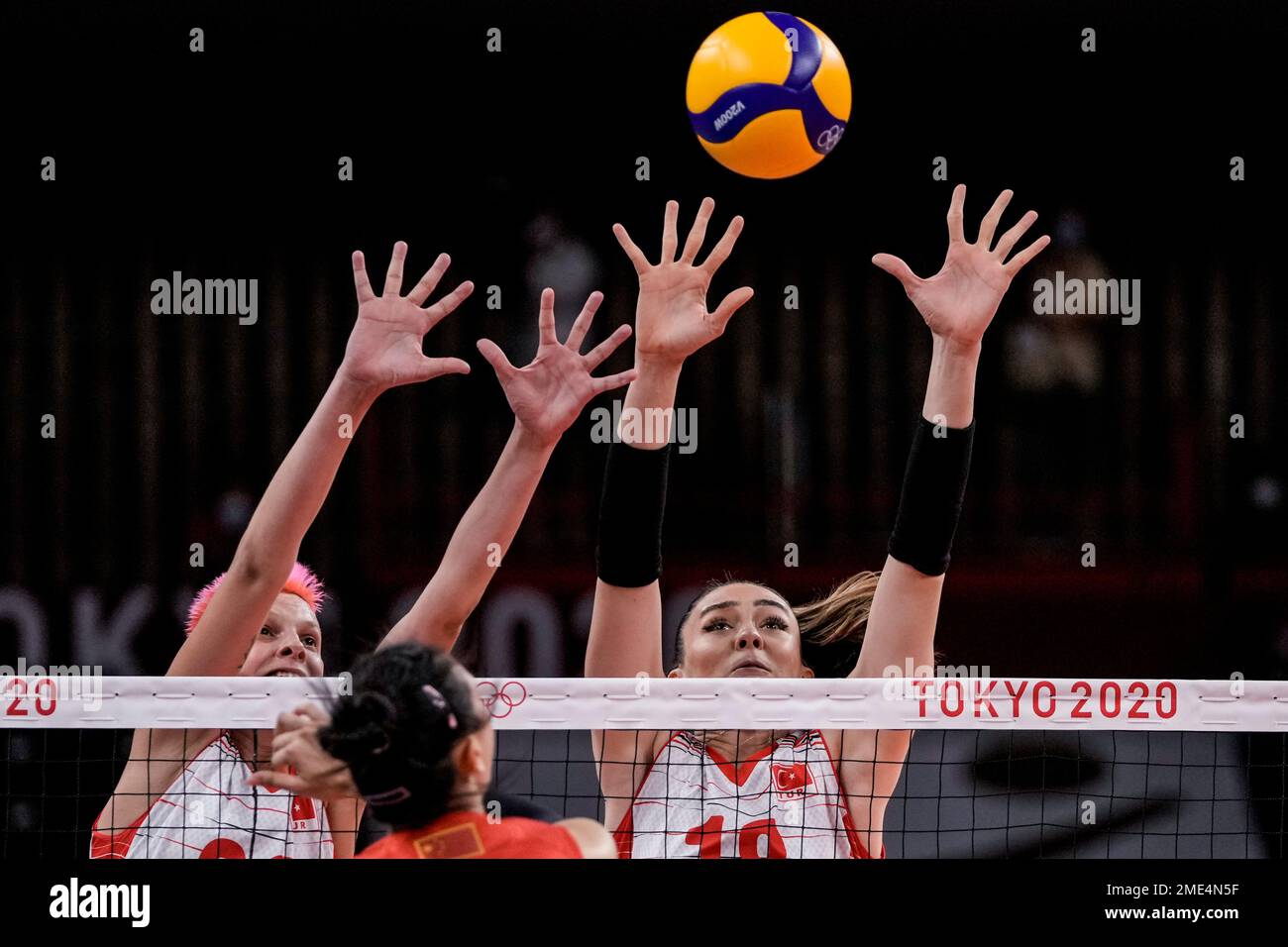 Turkey's Ebrar Karakurt, left, and Turkey's Zehra Gunes block a ball ...