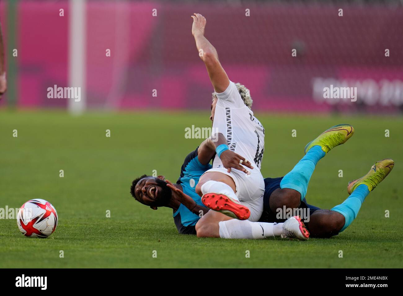New Zealand's George Stanger, front, and Honduras' Jorge Benguche fight ...