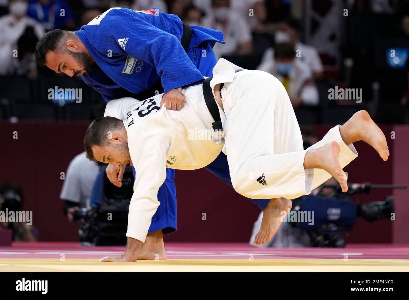 Baruch Shmailov of Israel, top, and Adrian Gomboc of Slovenia compete ...