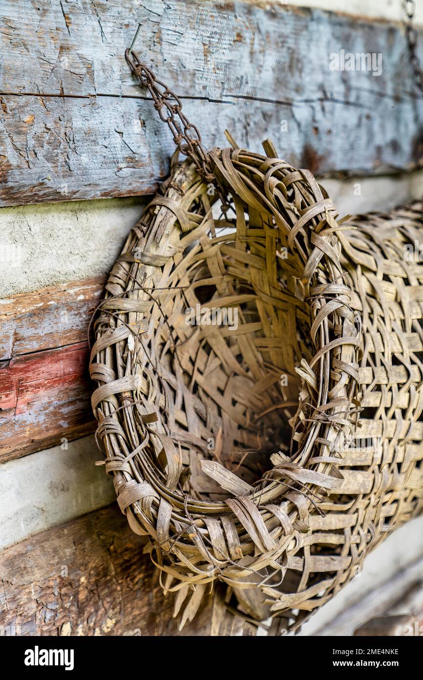 Woven basket hanging outside the Smoke House Gallery featuring native ...