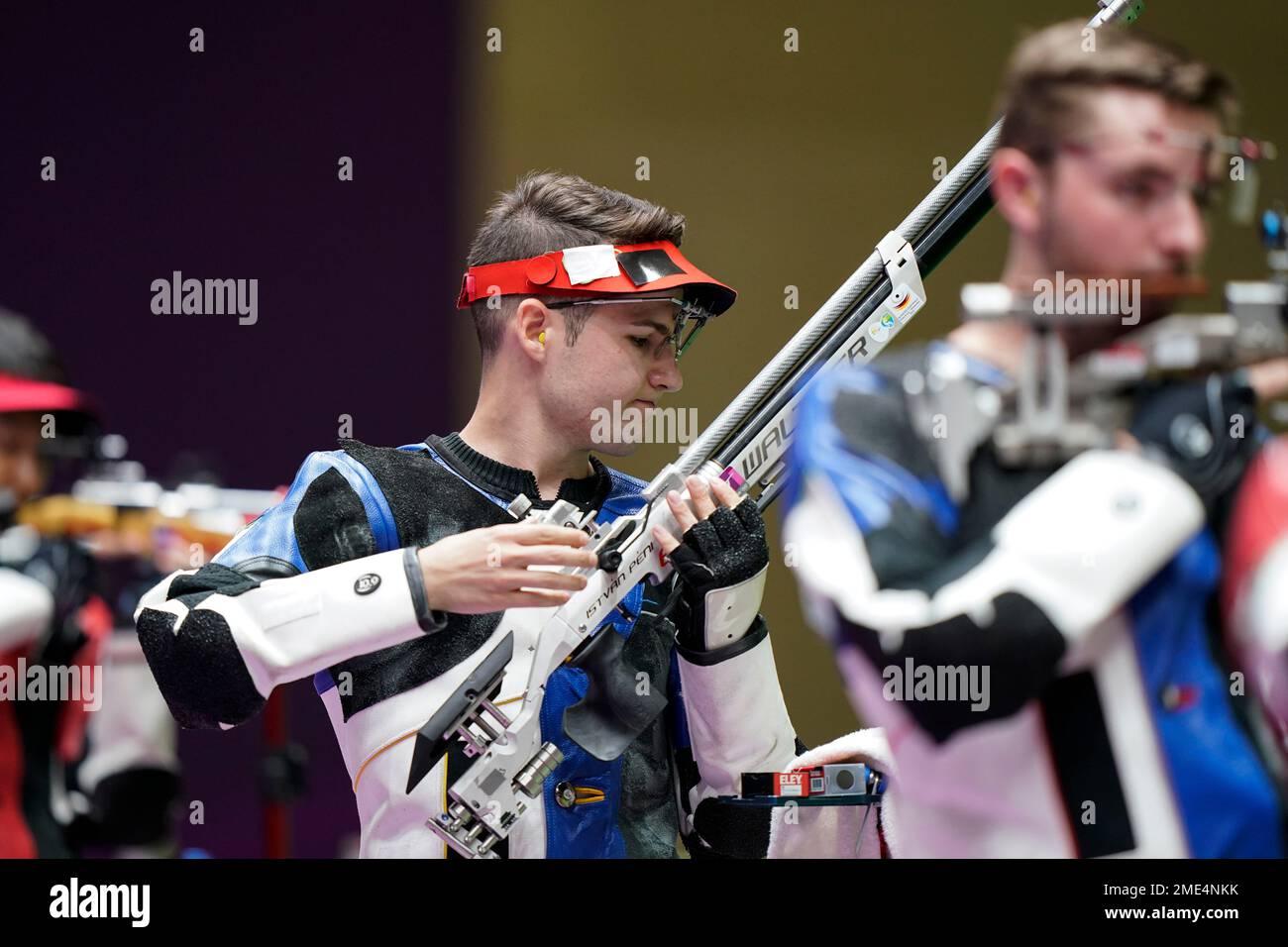 Istvan Peni, of Hungary, reacts after he was eliminated in the men's 10 ...