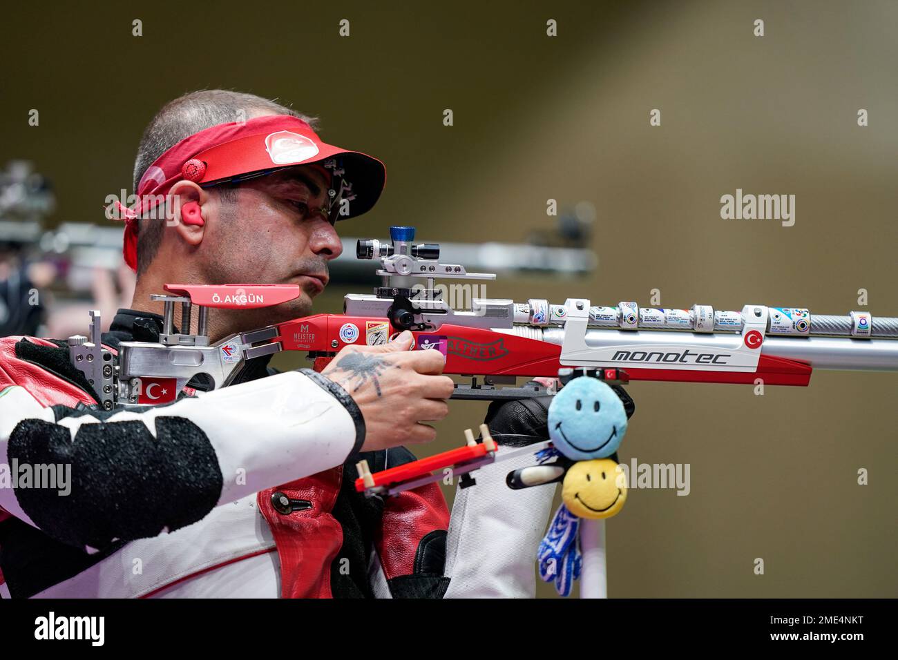Omer Akgun, of Turkey, competes in the men's 10-meter air rifle at the ...