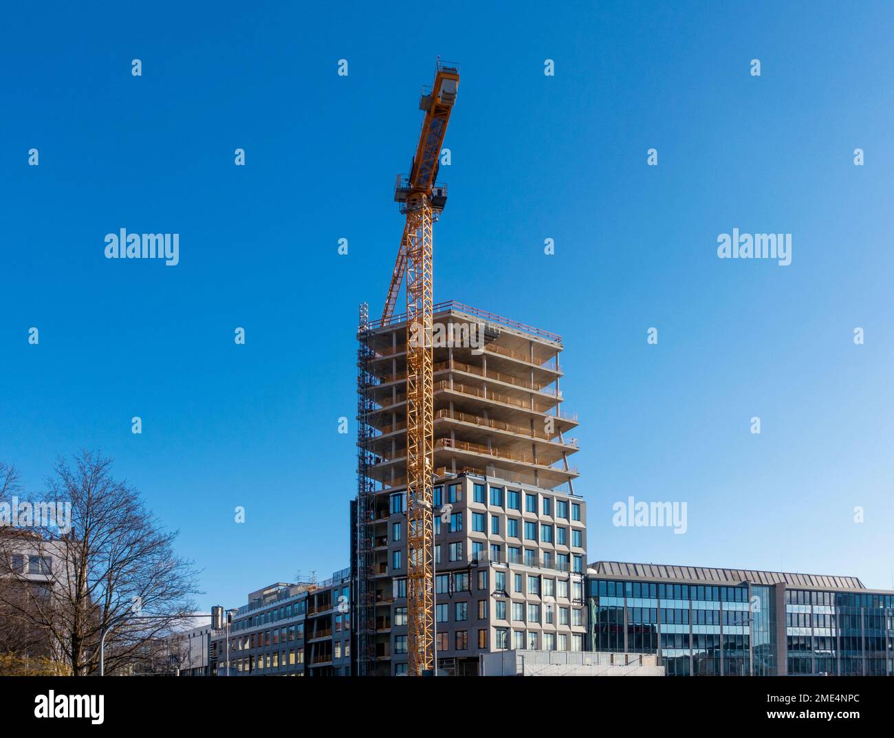 Germany, Bavaria, Munich, Modern office building under construction ...