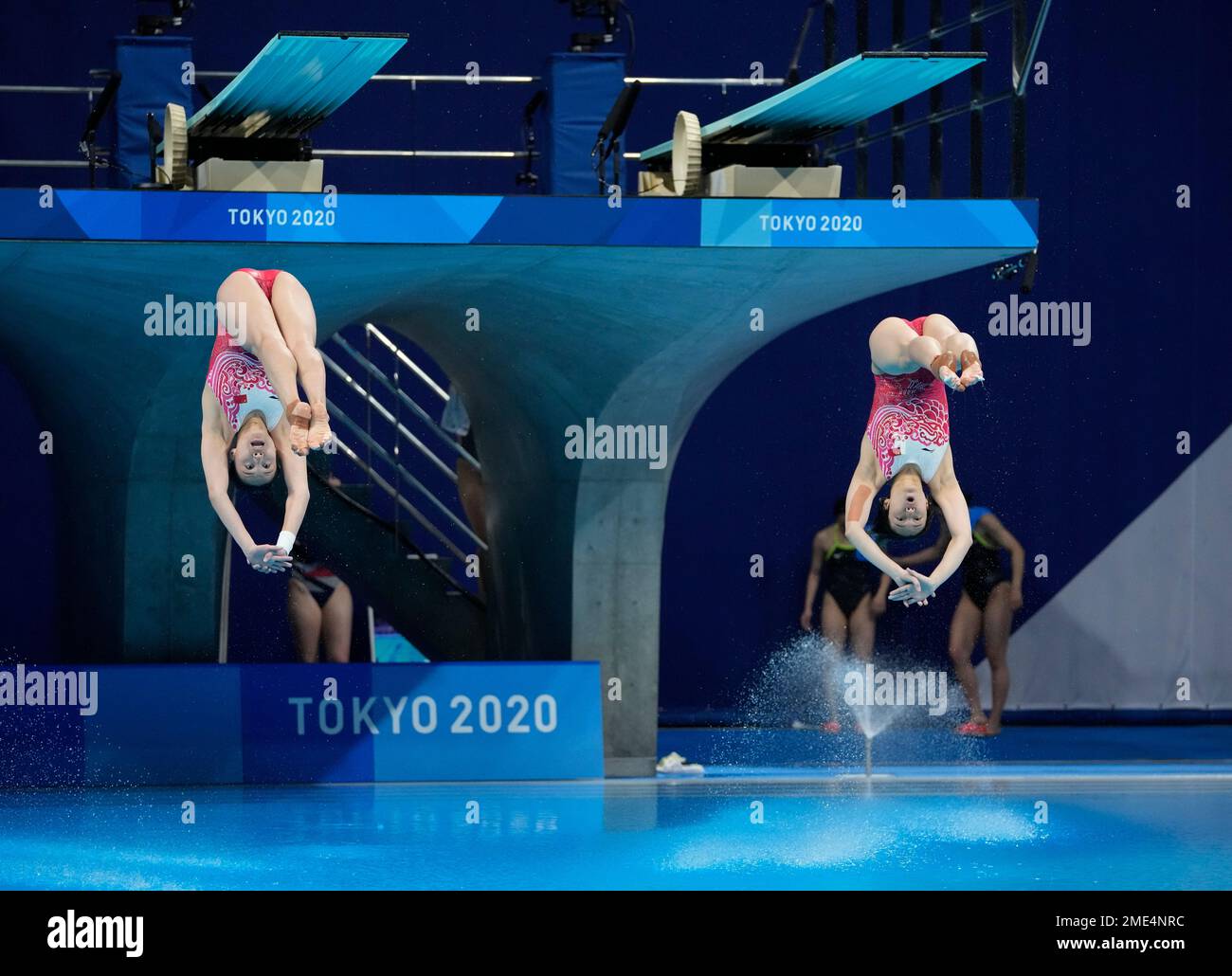 Shi Tingmao and Wang Han of China compete during the Women's ...