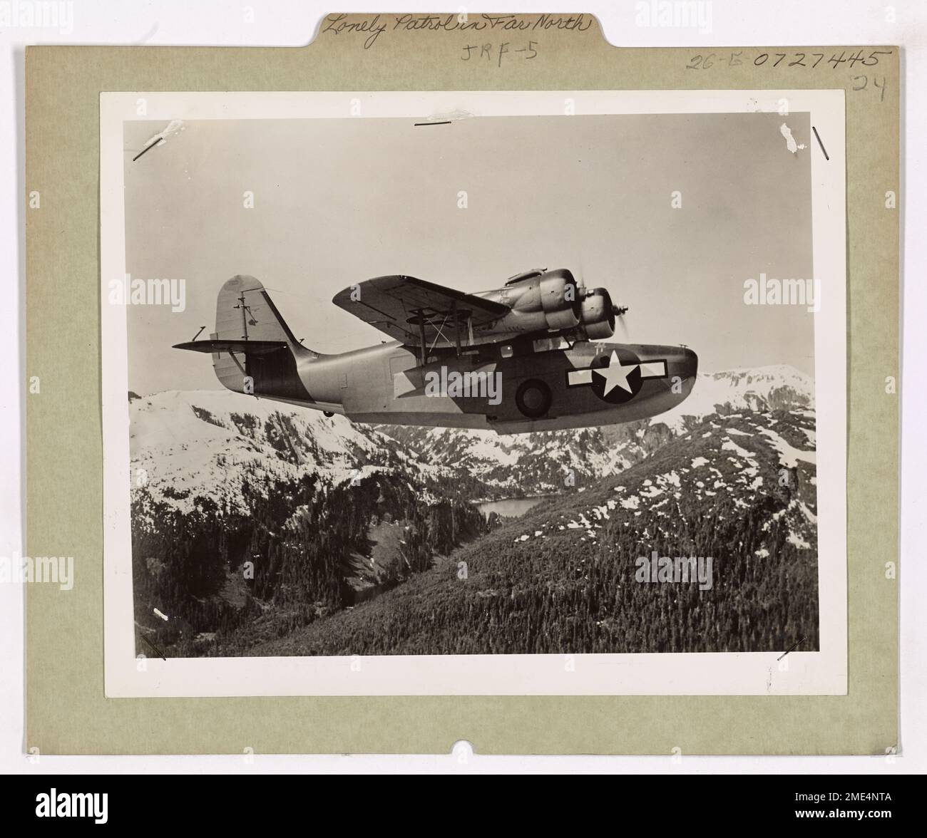 Lonely Patrol in the Far North. A Coast Guard patrol plane makes a ...