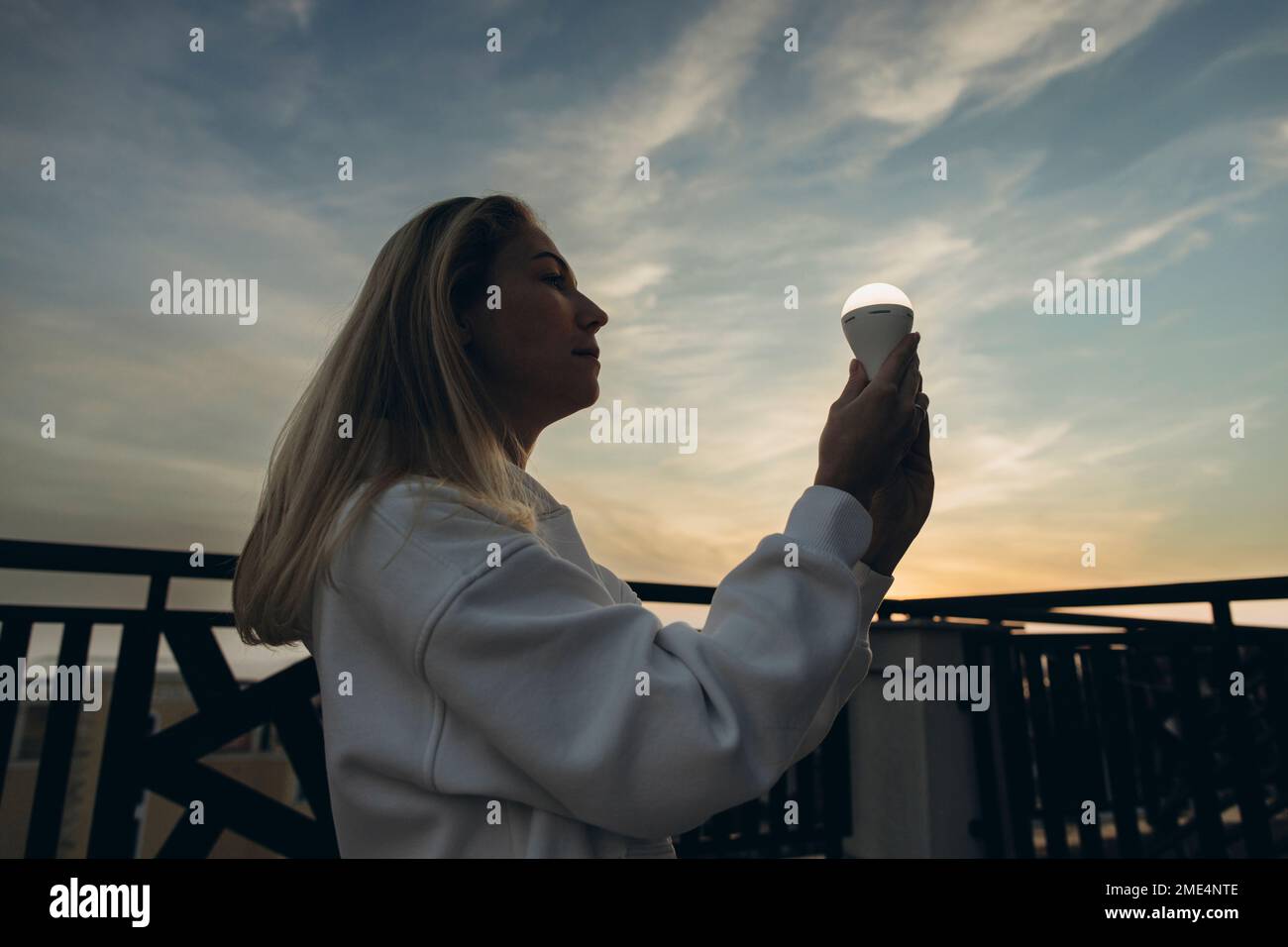Woman led light bulb hi-res stock photography and images - Alamy