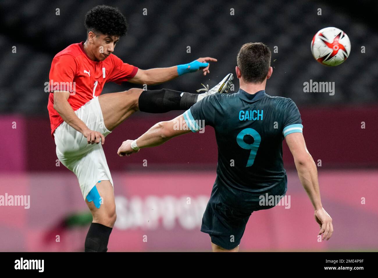 Egypt's Ammar Hamdy, left, and Argentina's Adolfo Gaich compete for the ...