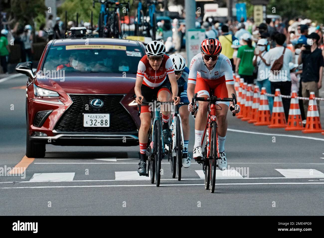 Anna Plichta of Poland front, Anna Kiesenhofer of Austria center, and ...