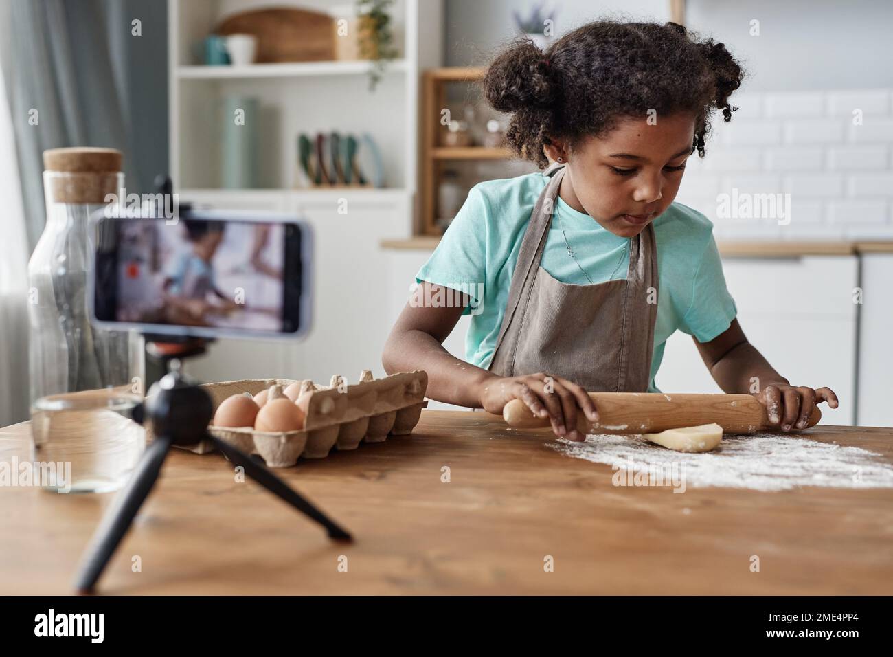 Black kid cooking hi-res stock photography and images - Alamy