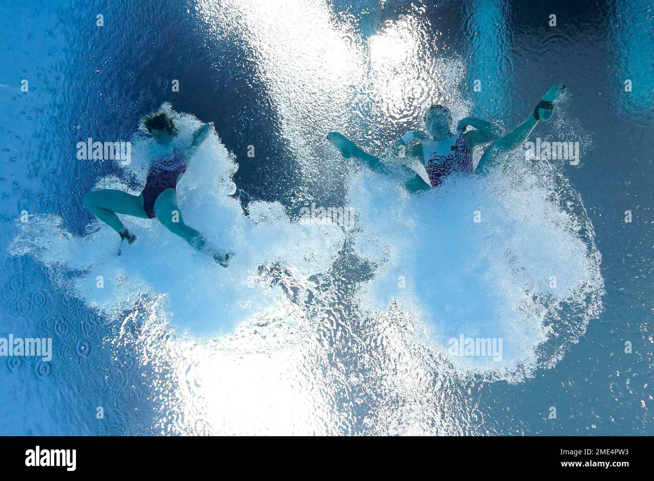 Gold medal winners Shi Tingmao and Wang Han, of China, compete in the ...