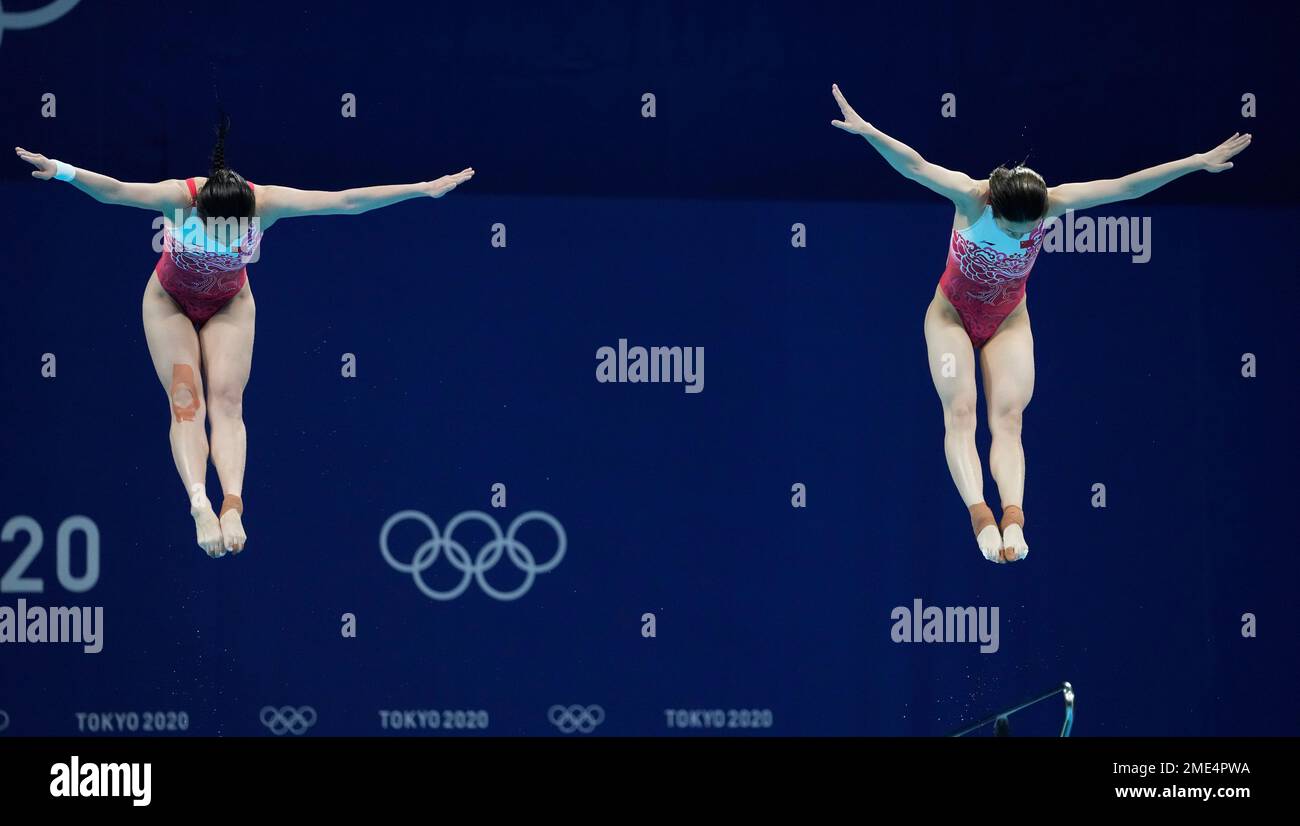 Shi Tingmao and Wang Han compete during the Women's Synchronized 3m ...