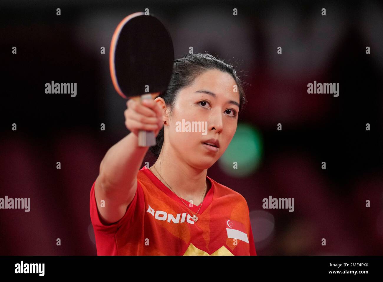 Singapore's Yu Mengyu waves to her fans after winning the table tennis ...