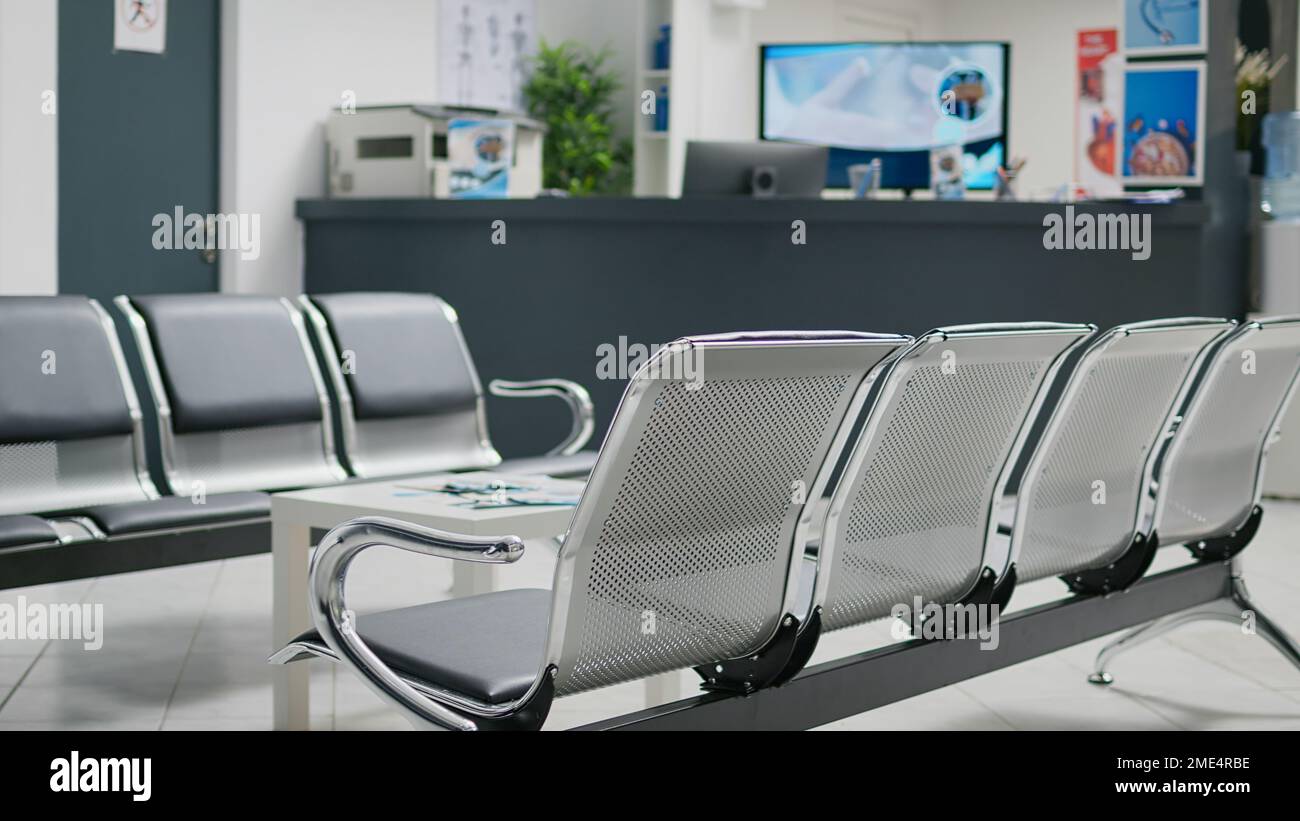 Empty hospital reception desk in waiting area lobby at medical health ...