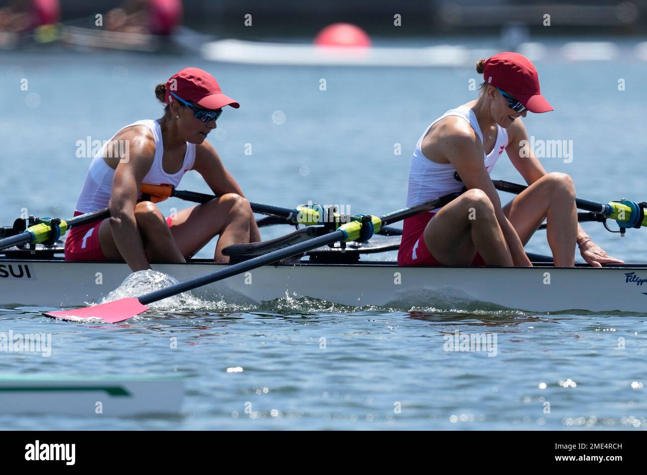 Frederique Rolvand Patricia Merz, of Switzerland, react after competing ...