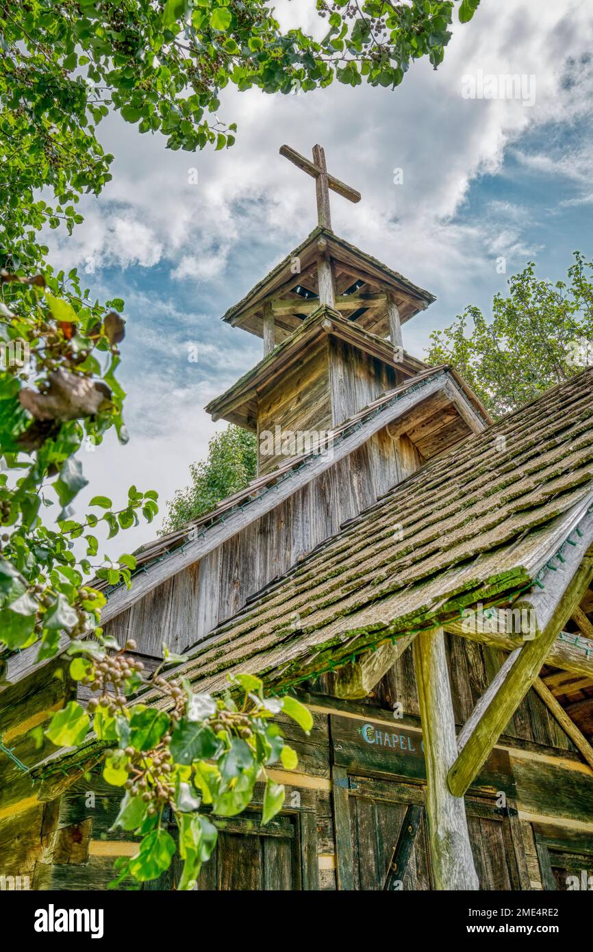 Looking up at the cross and bell tower of the Chapel of Peace Church at ...