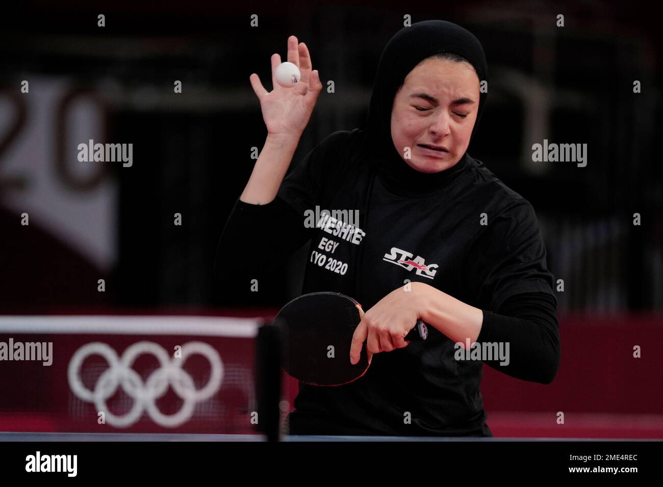 Egypt's Dina Meshref blocks the ball hit by Poland's Natalia Partyka ...