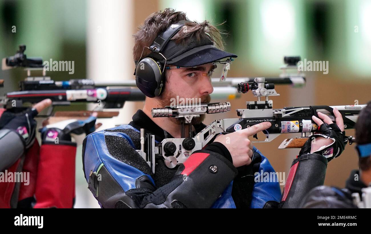 Lucas Kozeniesky, of the United States, competes in the men's 10-meter ...