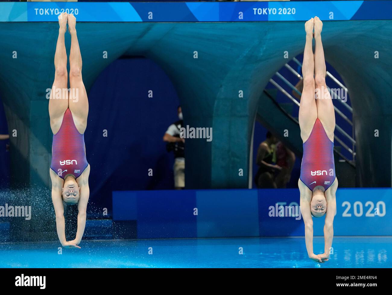 Alison Gibson and Krysta Palmer of the United States' compete during ...