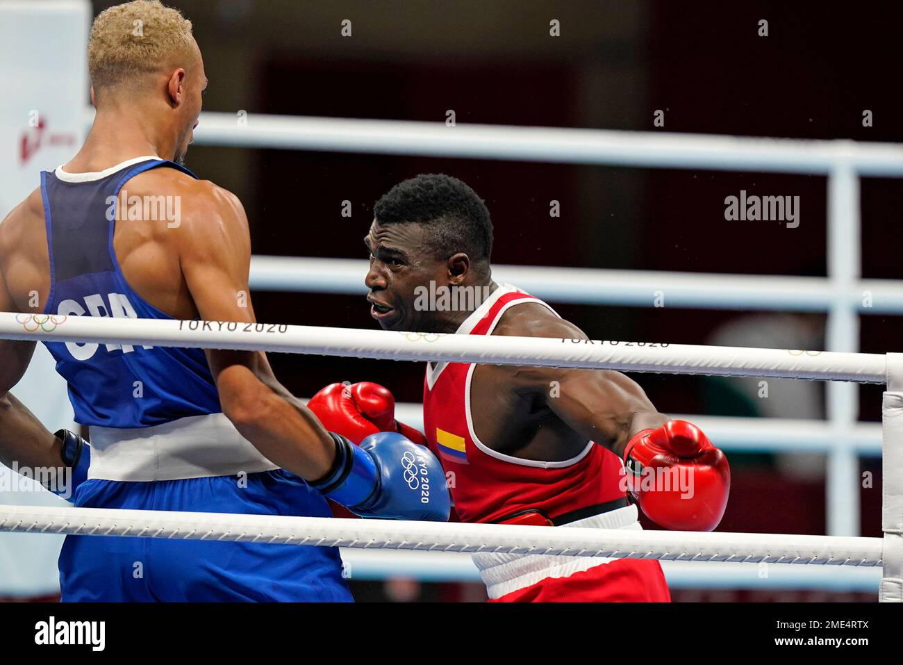 Colombia's Jorge Luis Vivas Palacios, right, exchanges punches with ...