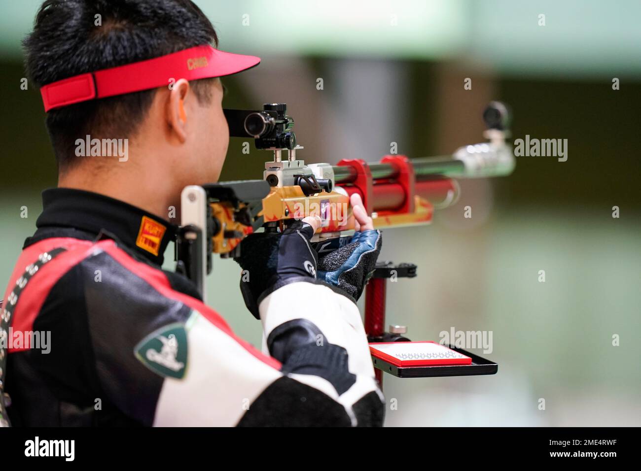 Yang Haoran, of China, competes in the men's 10-meter air rifle at the ...