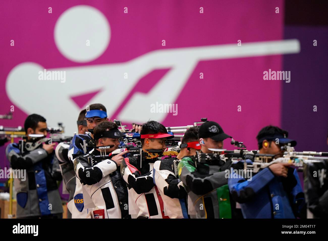 Athletes compete in the men's 10-meter air rifle at the Asaka Shooting ...