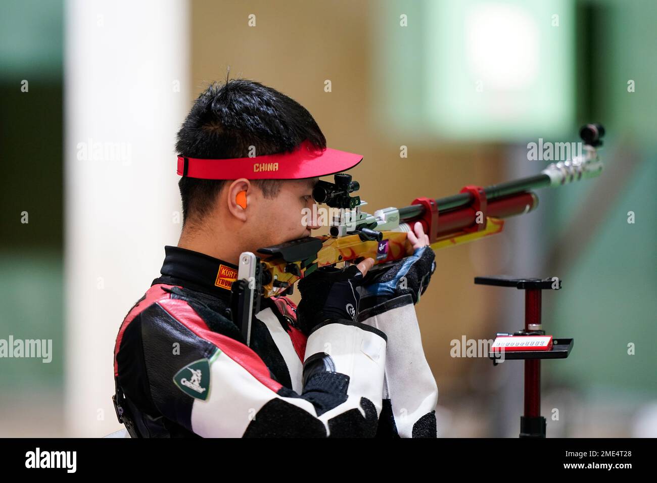 Yang Haoran, of China, competes in the men's 10-meter air rifle at the ...