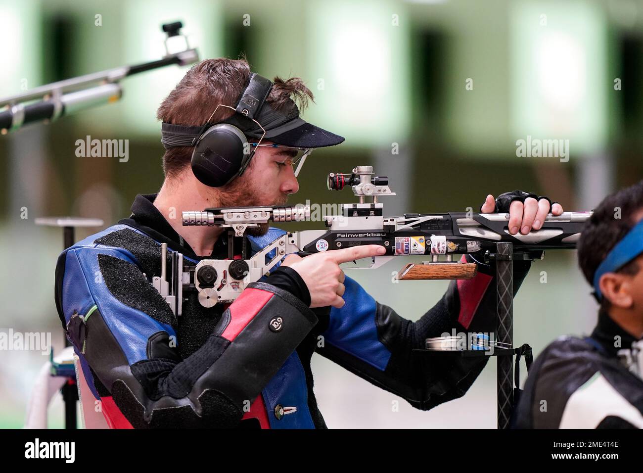 Lucas Kozeniesky, of the United States, competes in the men's 10-meter ...