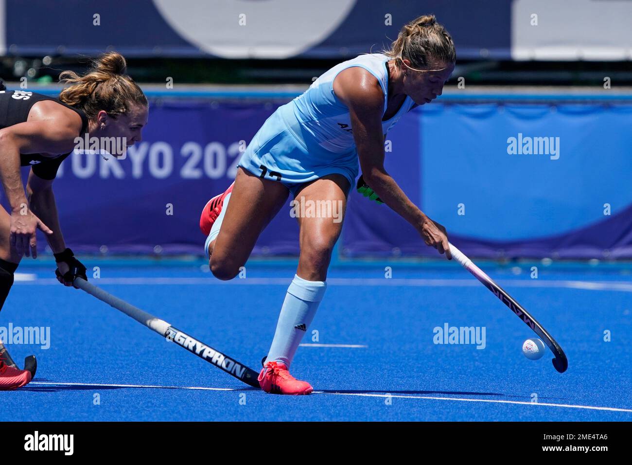 Argentina forward Delfina Merino (12) knocks the ball up the field ...