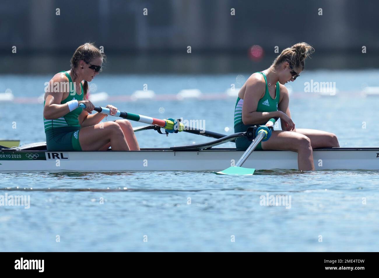 Monika Dukarska and Aileen Crowley, of Ireland, react after competing ...
