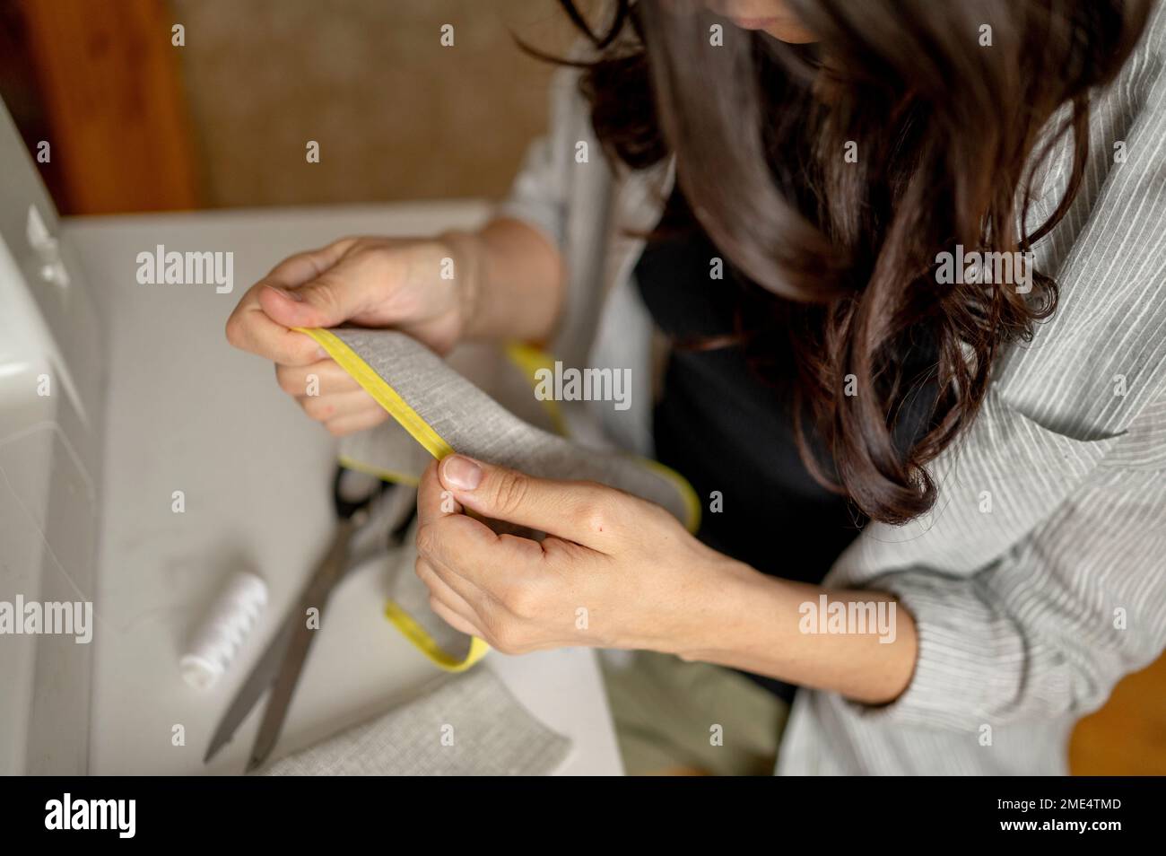 Holding fabric hi-res stock photography and images - Alamy