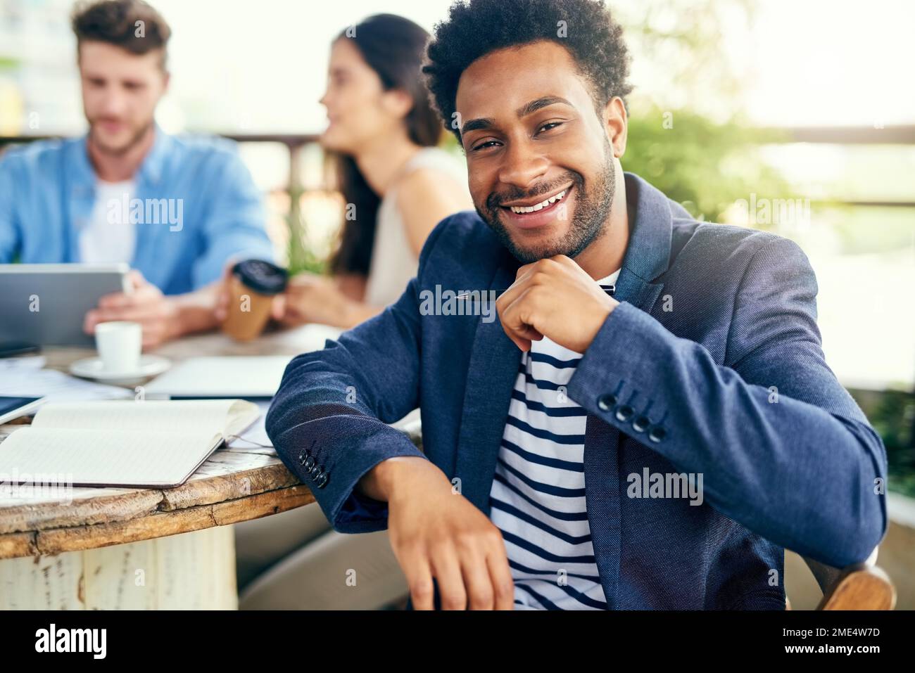 Theres no harm in doing business a bit differently. Portrait of a young businessman having a ...