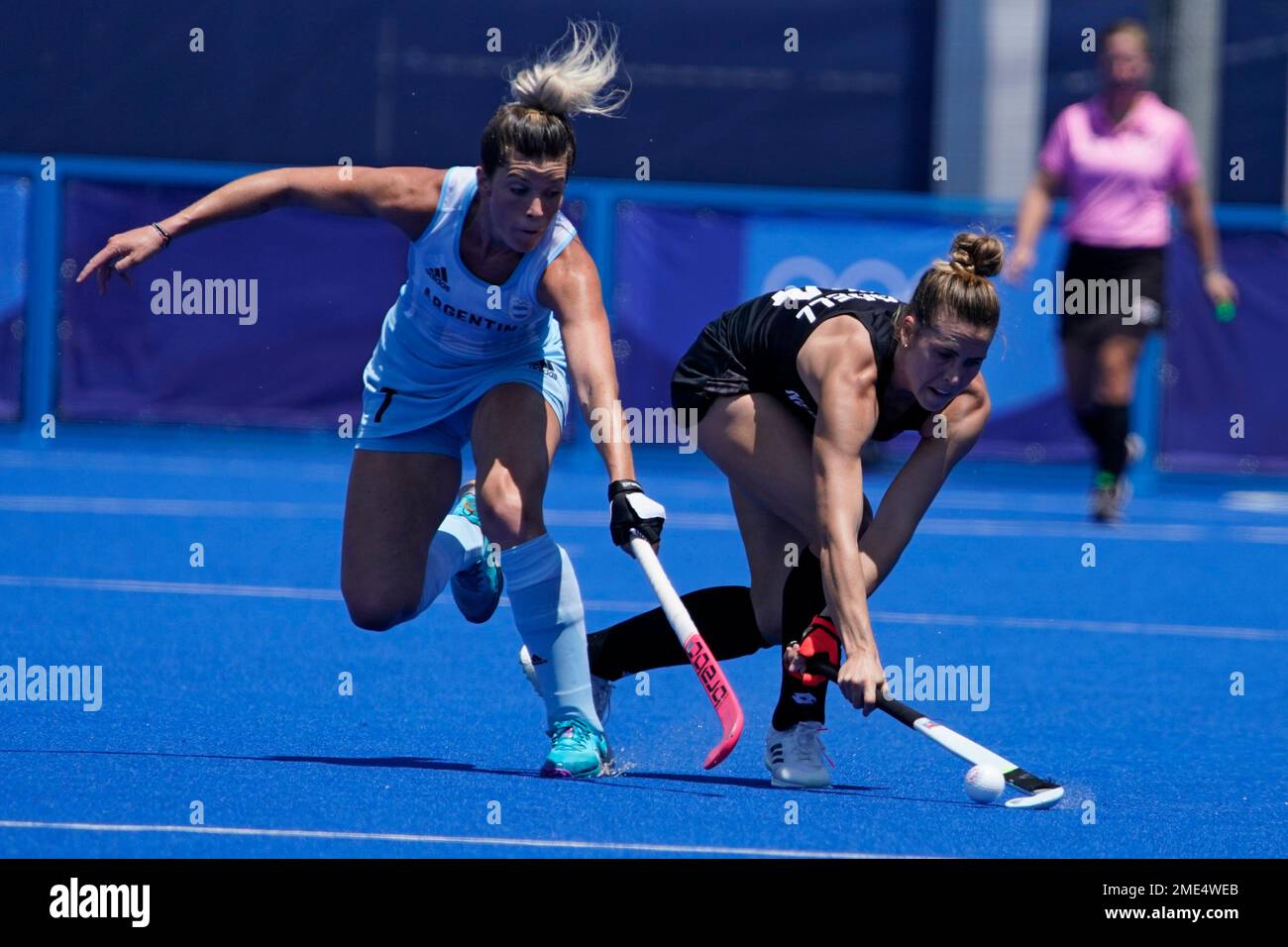 New Zealand midfield Rose Keddell (24) passes around Argentina forward ...