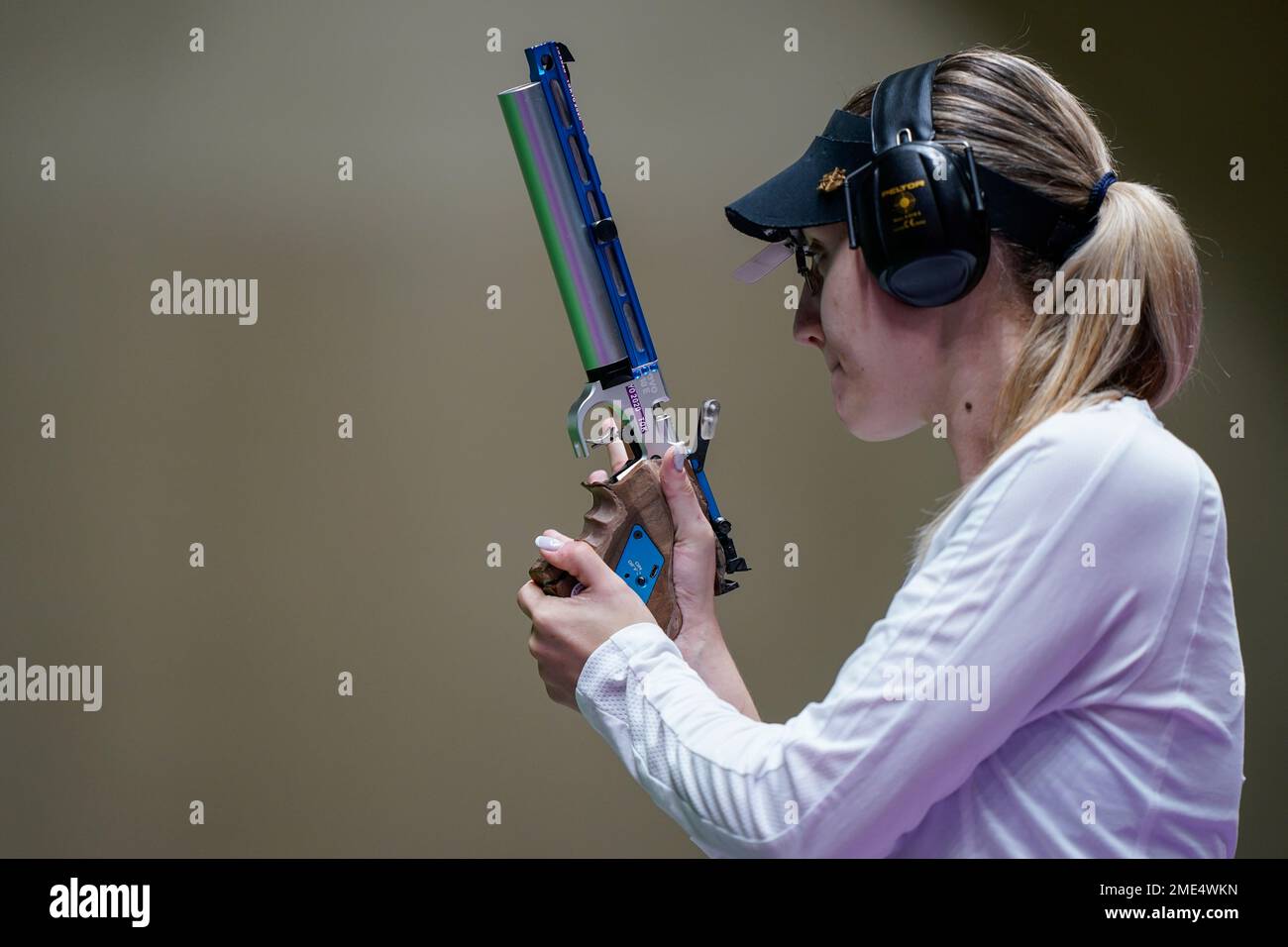 Anna Korakaki, of Greece, competes in the women's 10-meter air pistol ...