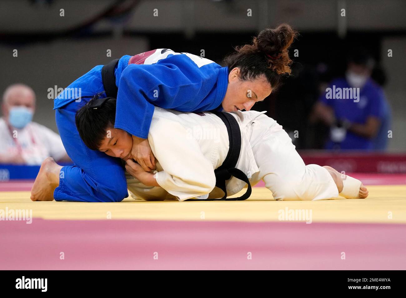 Andreea Chitu of Romania, top, and Nguyen Thuy of Vietnam compete ...
