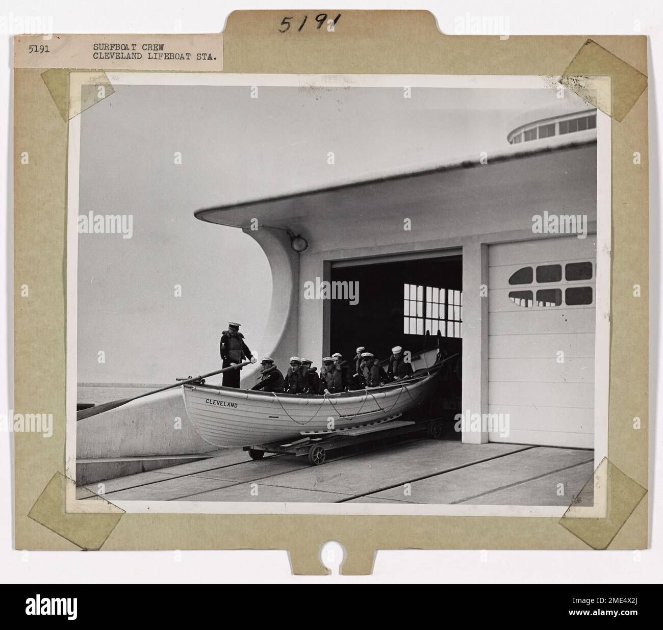 At the Cleveland Lifeboat Station, Coast Guard crew members prepare to ...
